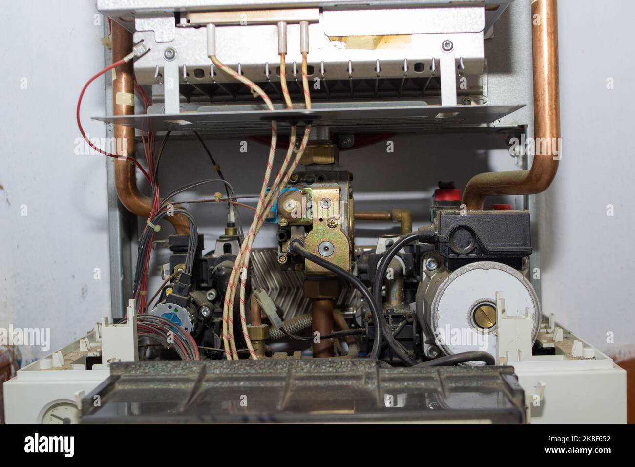 On the wall in the room a gas boiler is disassembled for repair Stock ...