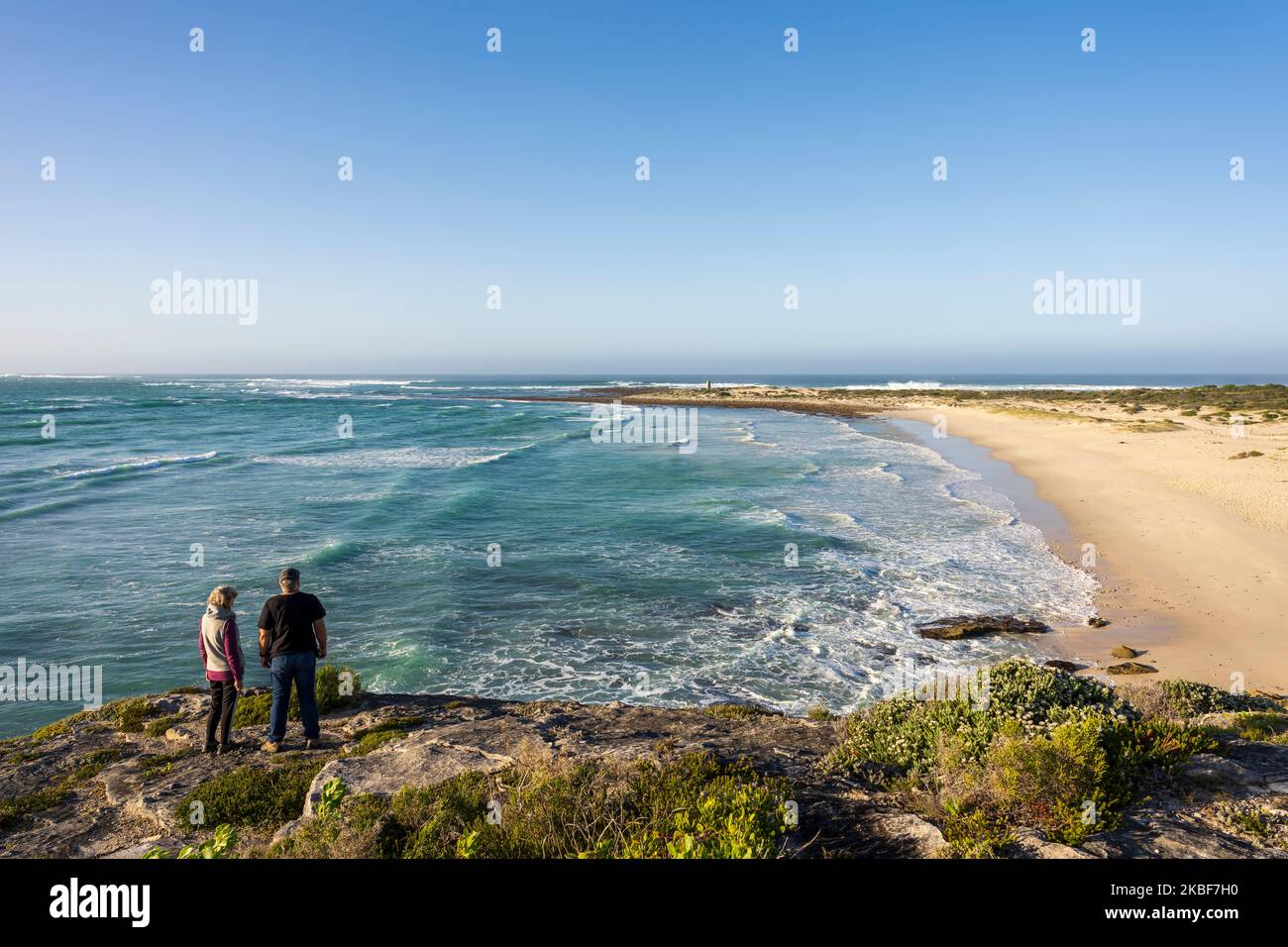 Tourists looking towards Struis Point (Struispunt) and Saxon Reef from ...