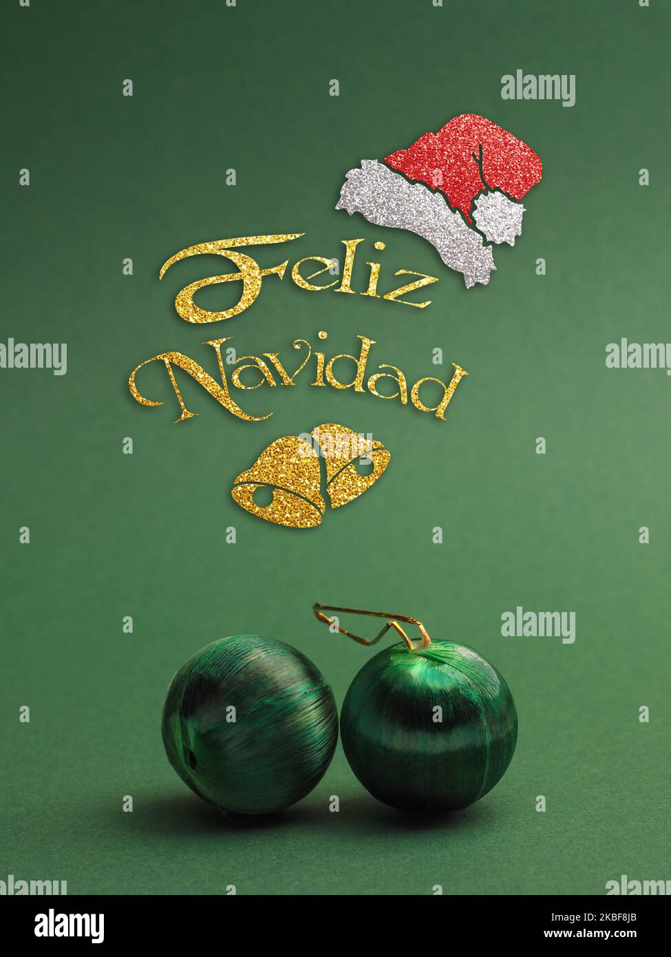 Green vintage Christmas baubles on a green background with text Feliz ...
