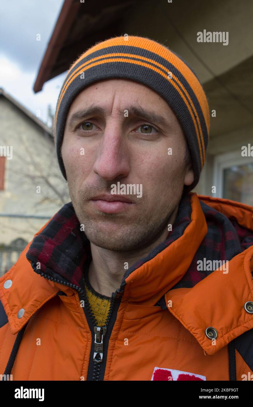 Man with orange jacket hi-res stock photography and images - Alamy