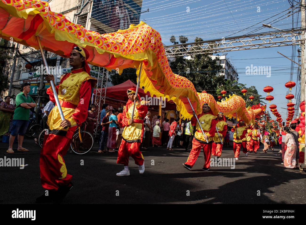 Dragon dancers participate in the Chinese New Year parade to mark the ...