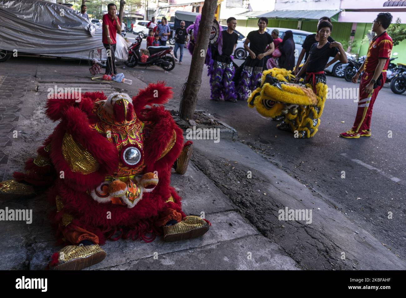 A group of dancers prepares to perform the Chinese traditional dragon ...