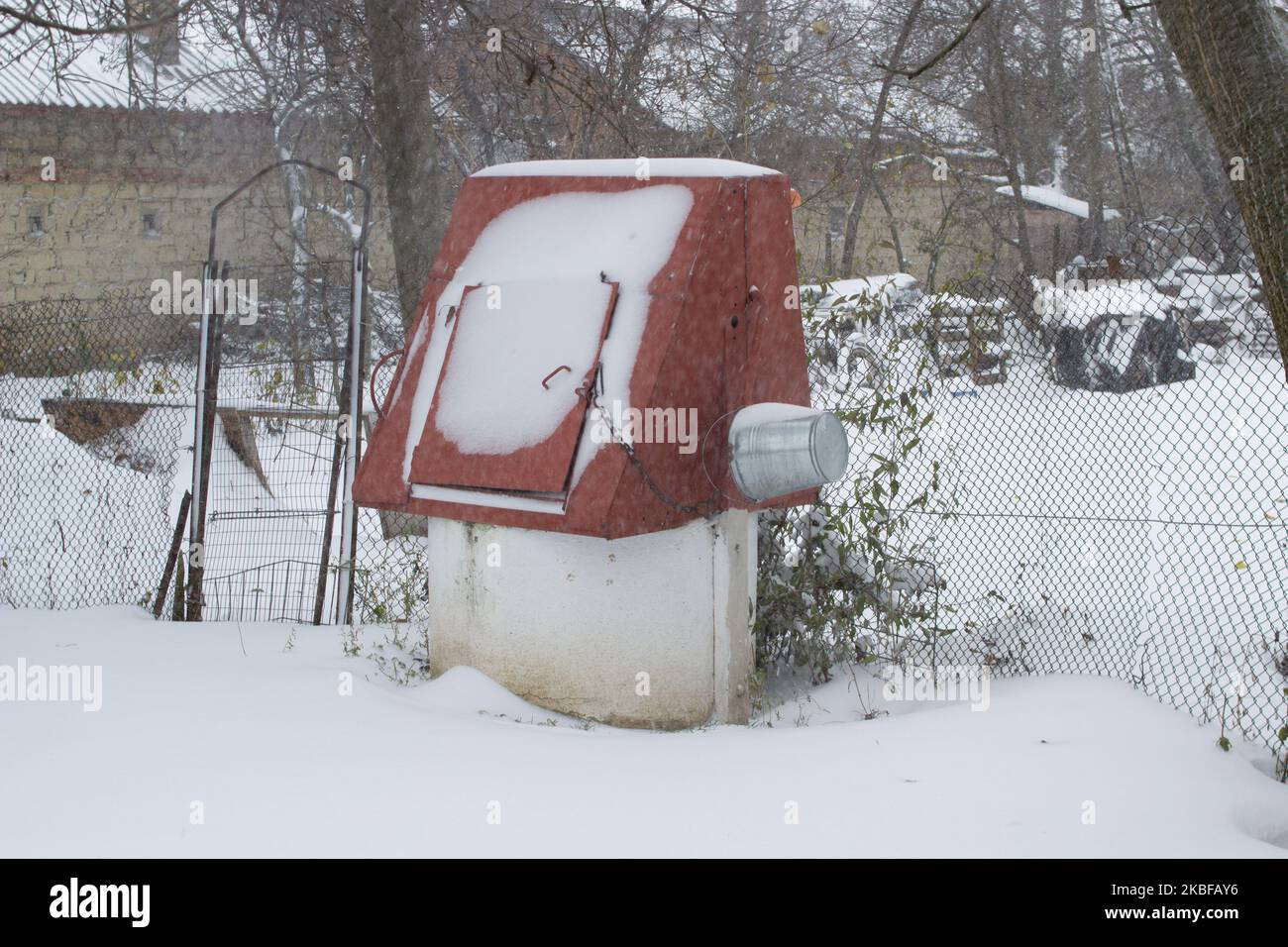 In the winter, a well of water became snowy Stock Photo - Alamy