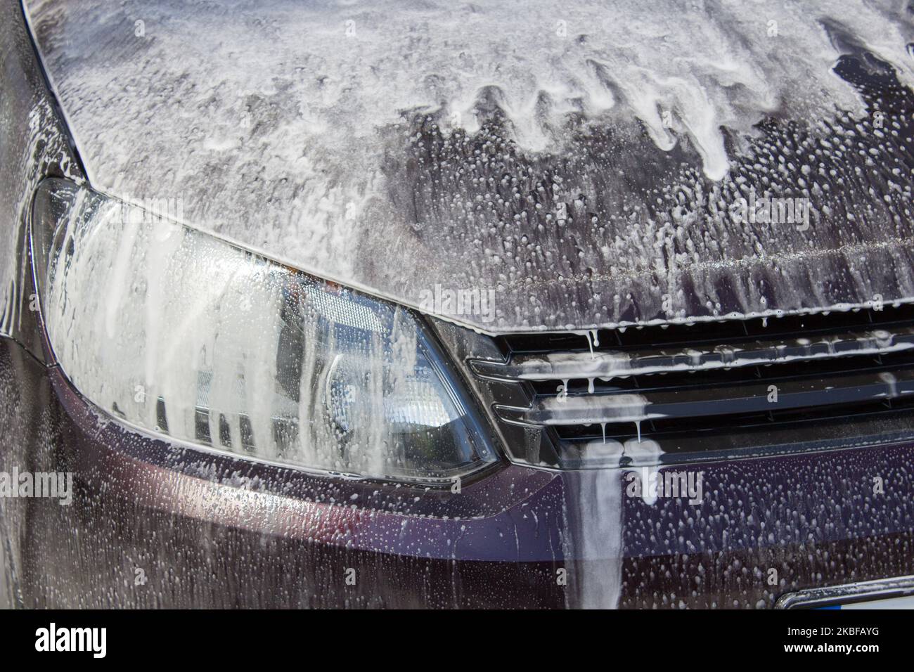 soapy foam on the surface of the car Stock Photo - Alamy