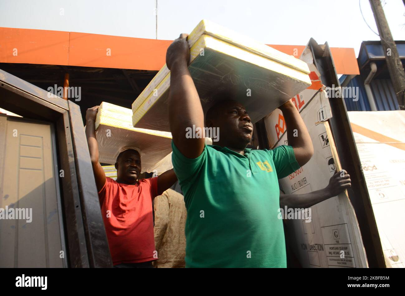 Traders rescuing some remains of their properties at the popular timber ...