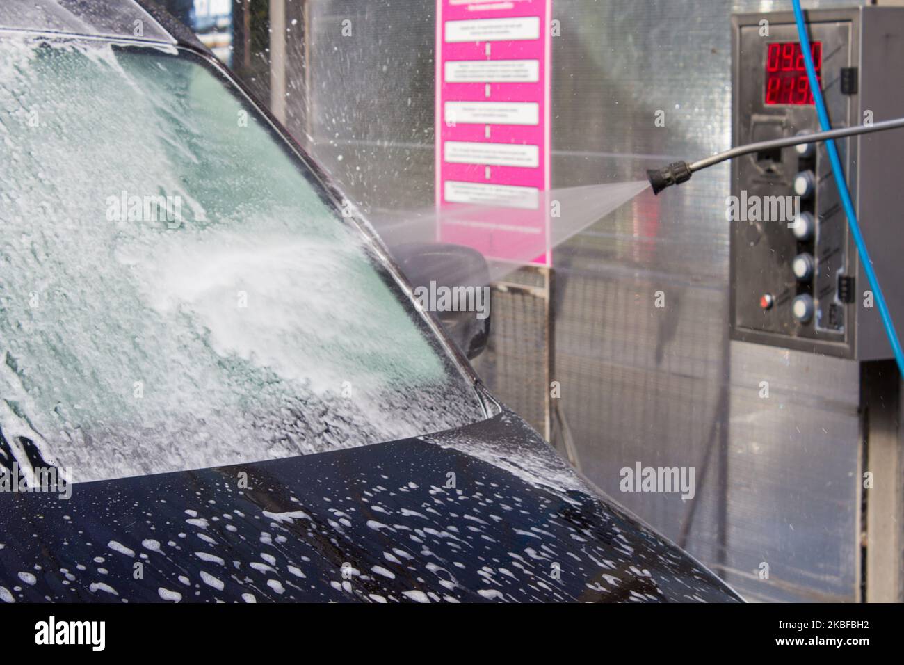 Gentle Car Washing. Modern Compact Car Covered by Water Stock Photo - Alamy