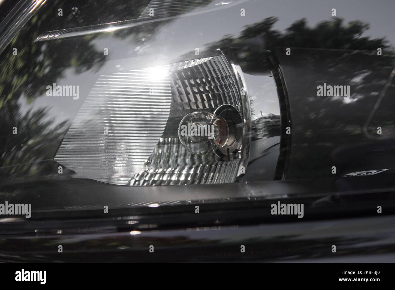 beautiful automobile headlight closeup with sun rays Stock Photo - Alamy