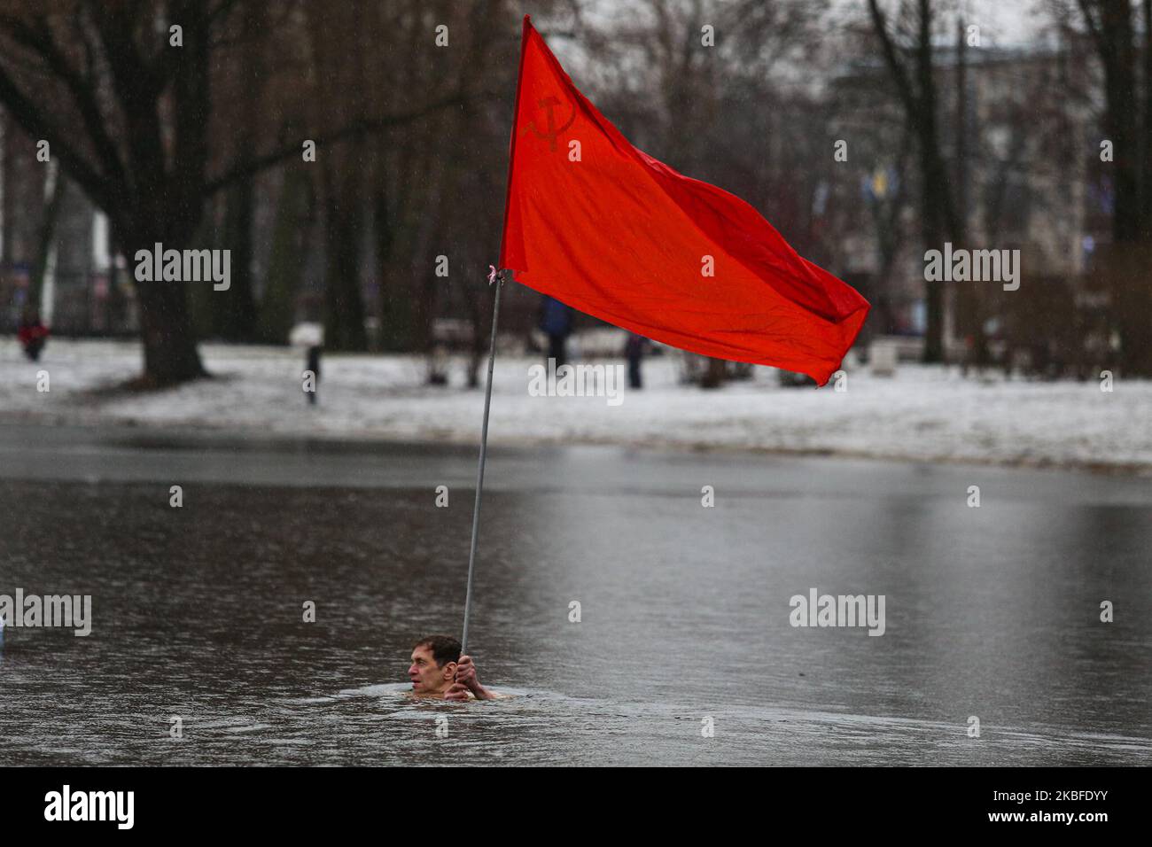 A winter swimming club during the traditional swim in honor of the ...
