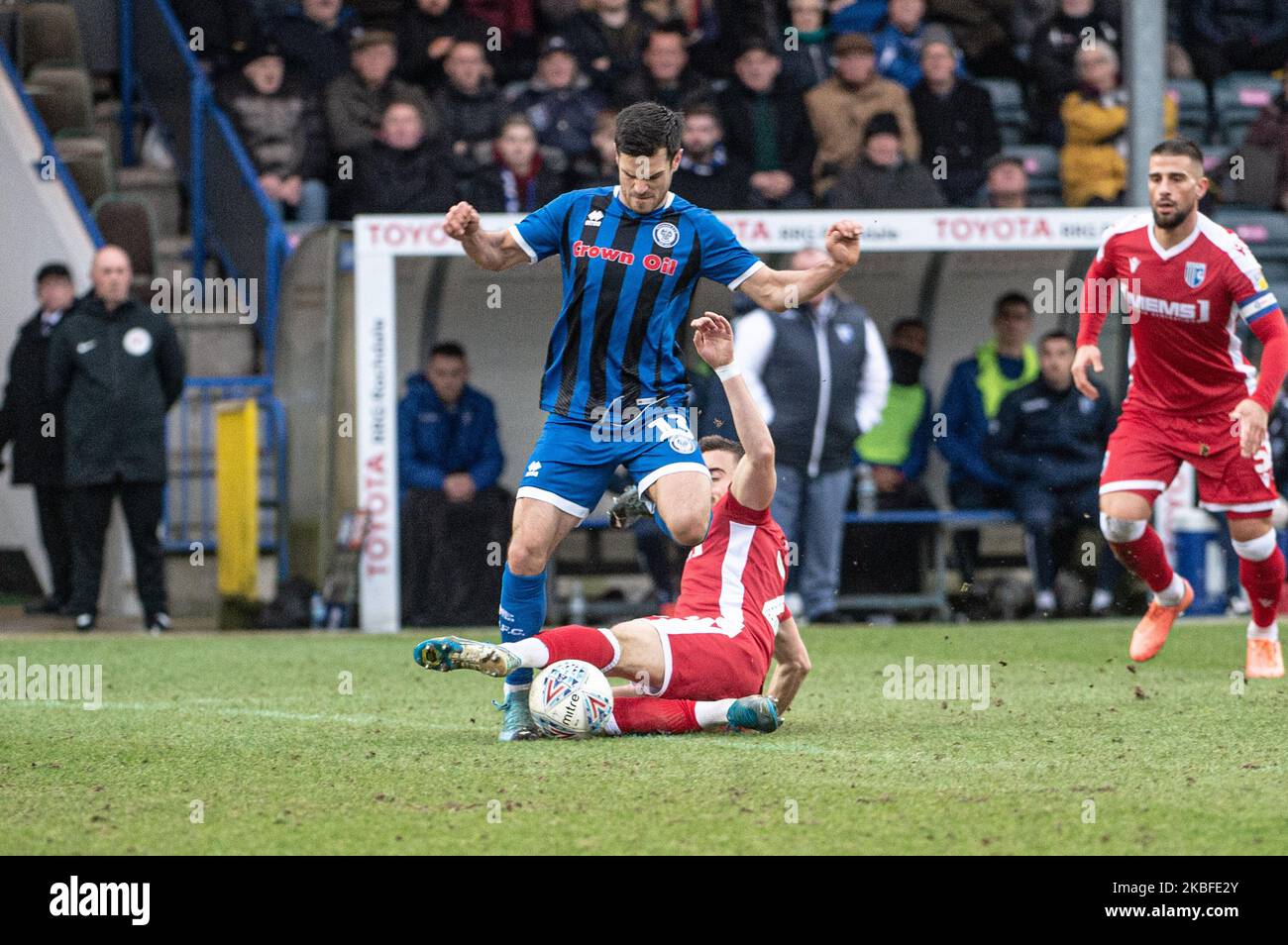 Oliver Lee of Gillingham FC tackles Jimmy Keohane of Rochdale FC during ...
