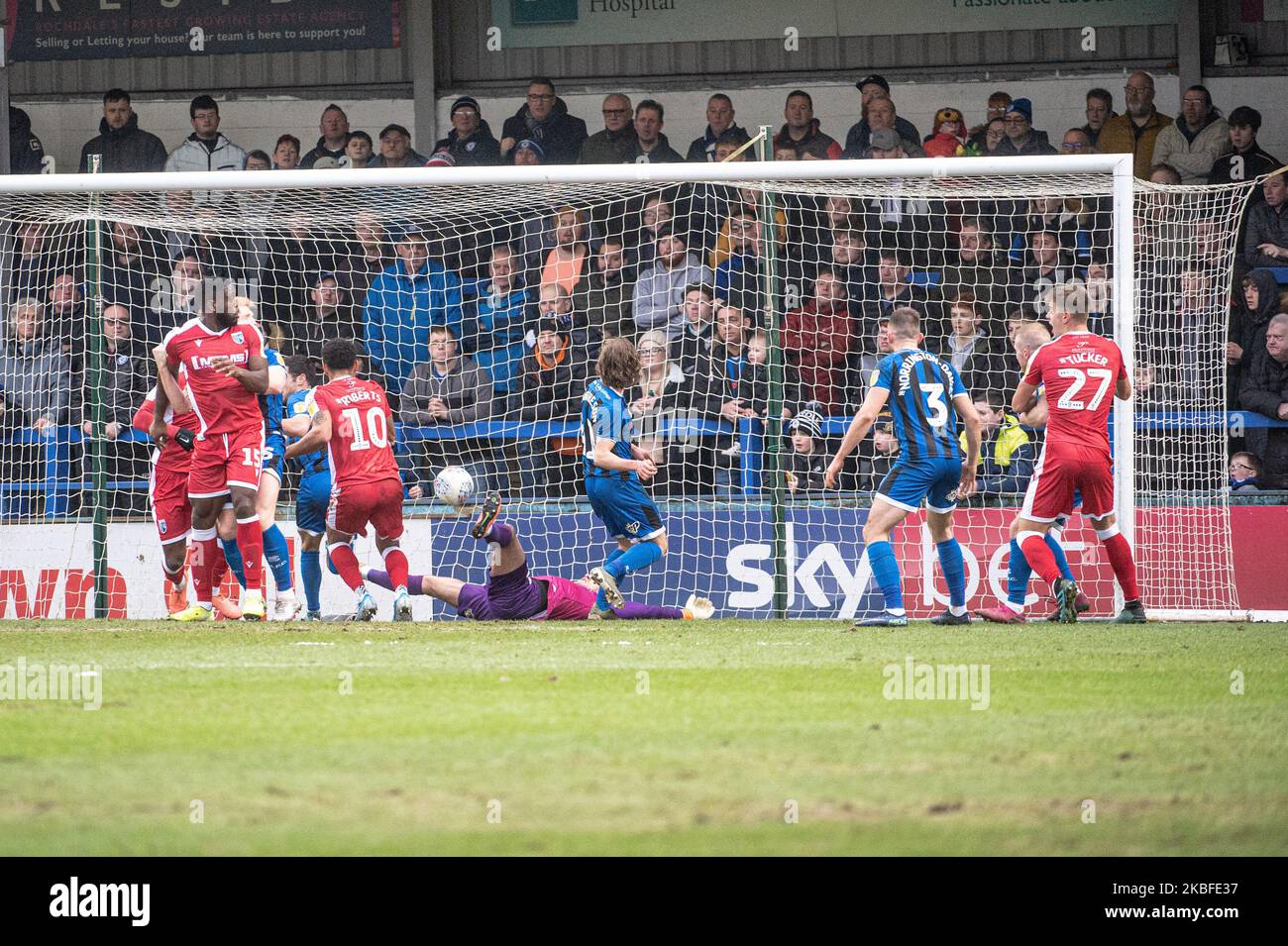 Jordan Roberts of Gillingham FC heads the ball and scores a goal during ...