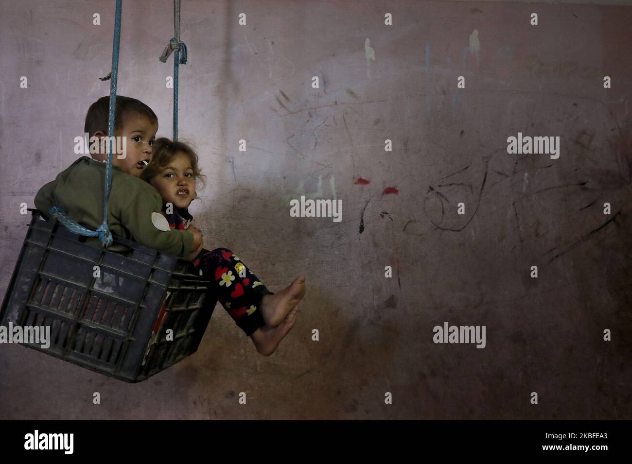 Palestinian children play at an empoverished neighbourhood in Gaza City ...