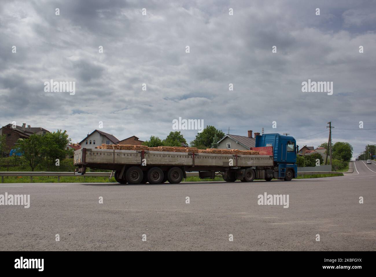 Truck working on road hi-res stock photography and images - Alamy