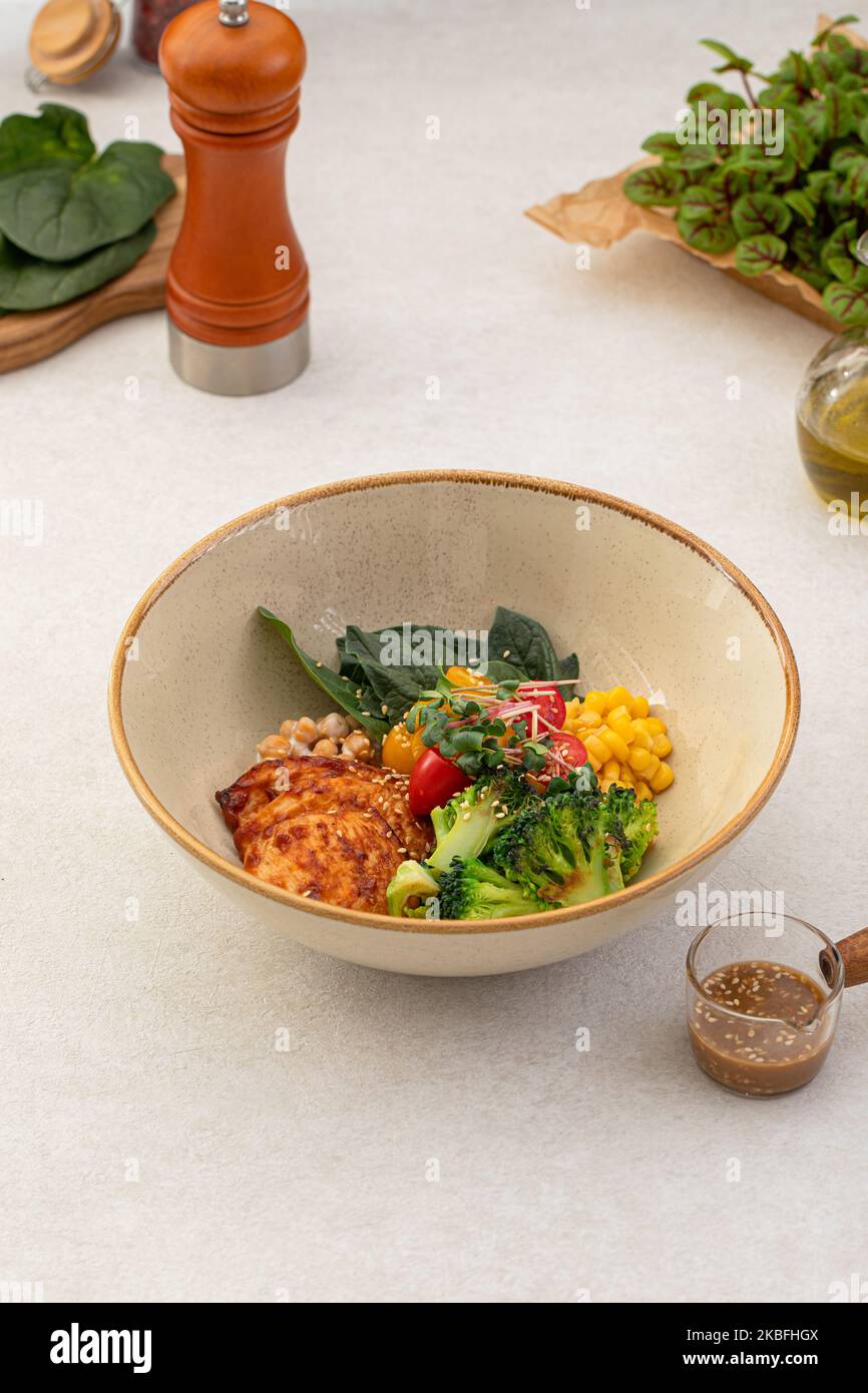 Chicken poke bowl with vegetables and corn Stock Photo - Alamy