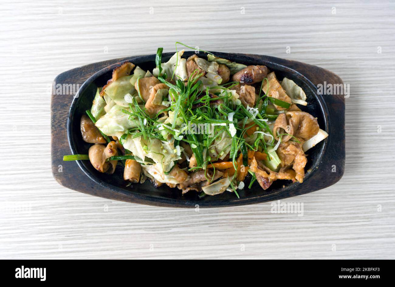 Horumon Sutamina Itame, vegetable stir fry with pork innards served on ...