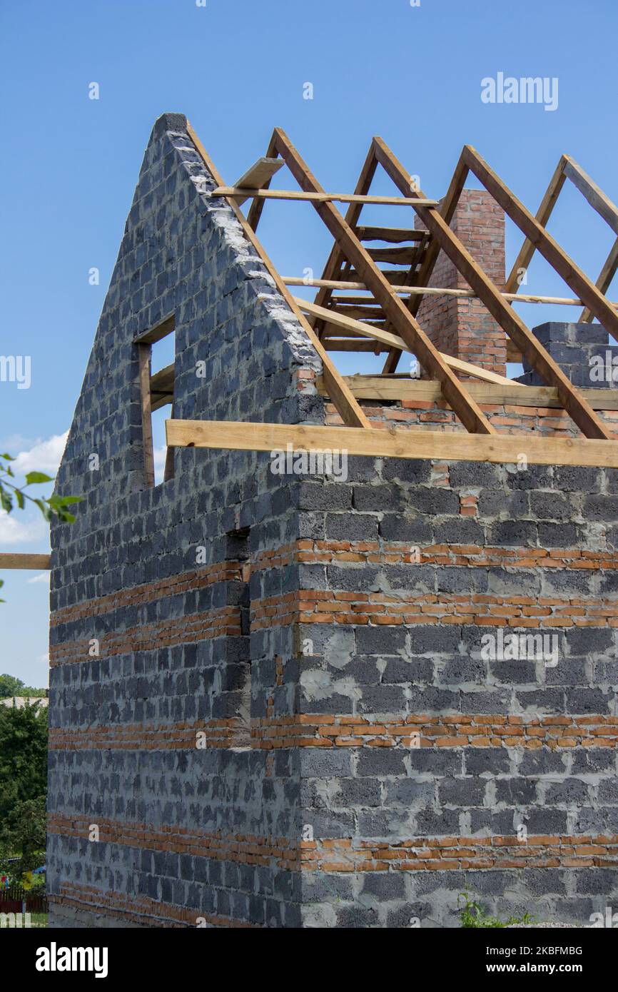 house under construction with the roof structure of wood Stock Photo ...