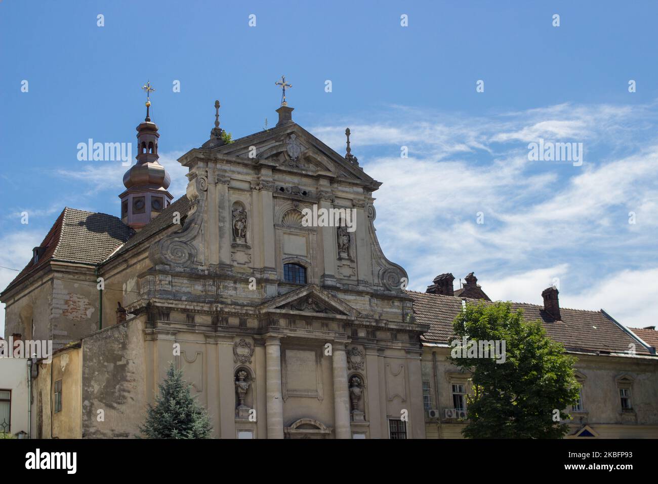 old Catholic church in the city in a dangerous condition Stock Photo ...