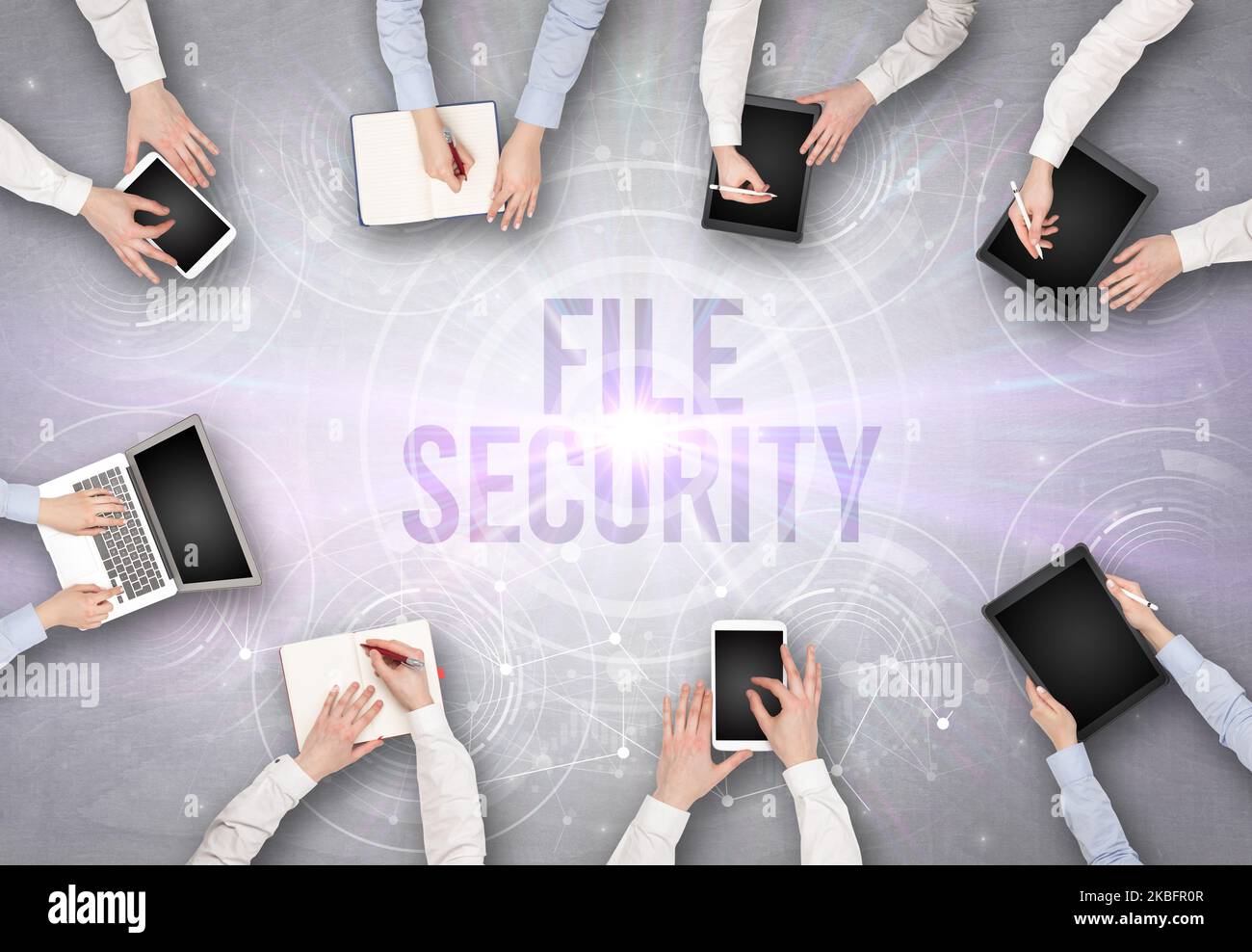 Group of people in front of a laptop, security concept Stock Photo - Alamy