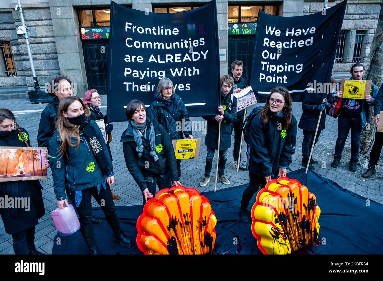 A group of activists is shouting slogans against Shell, during the ...