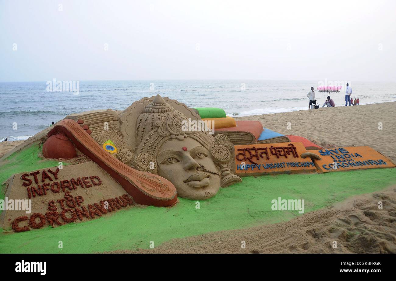 Sand sculpture of goddess Saraswati is seen at the Bay of Bengal Sea's ...