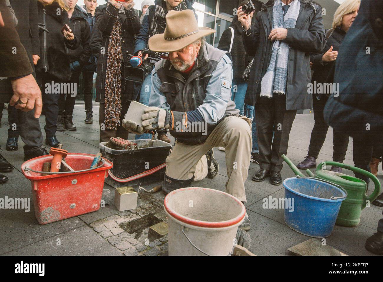 German artist Gunter Demnig puts 18 new stumbling stones in the city ...