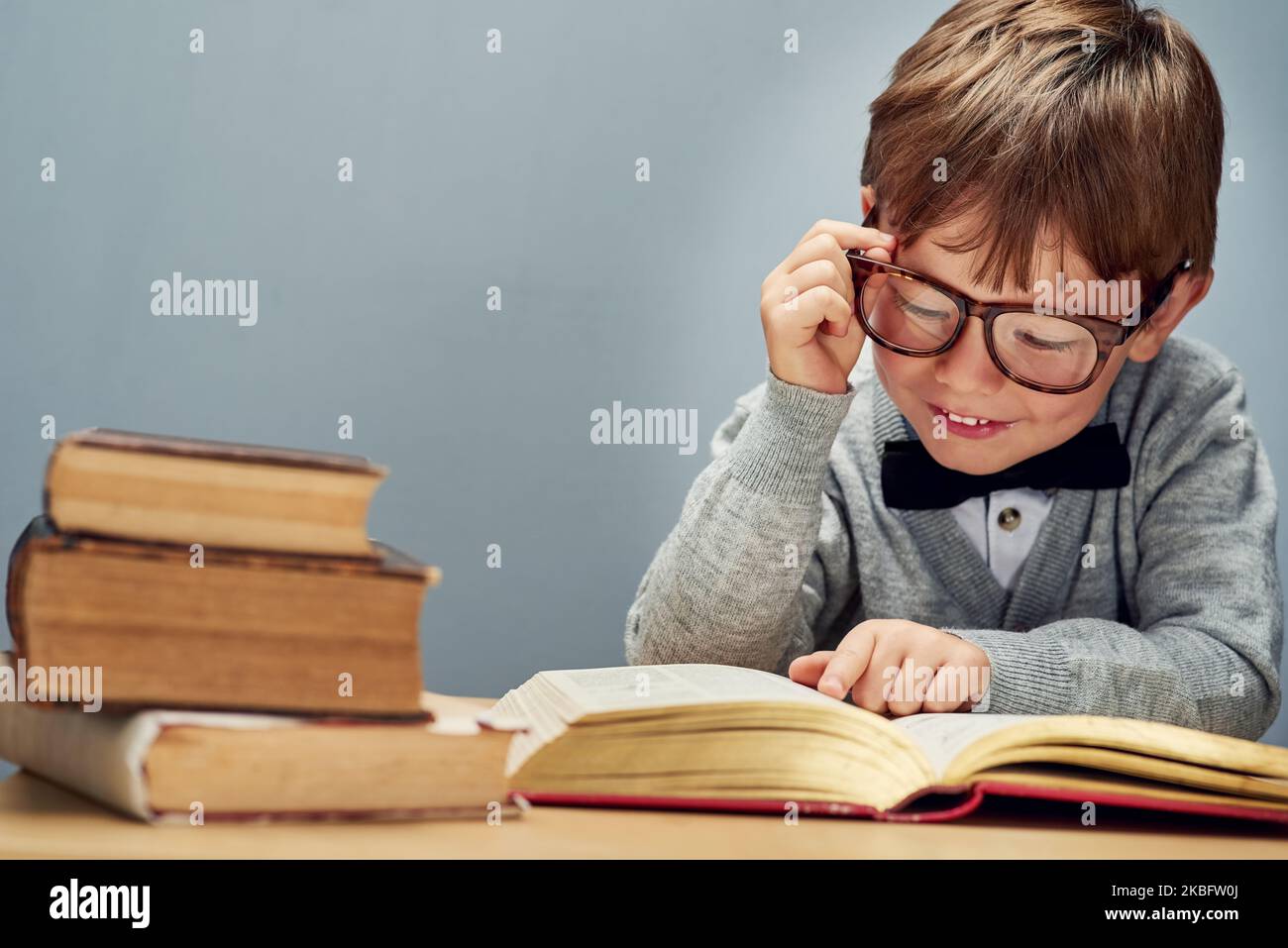 Nothing grows a mind like knowledge. Studio shot of a smart little boy ...