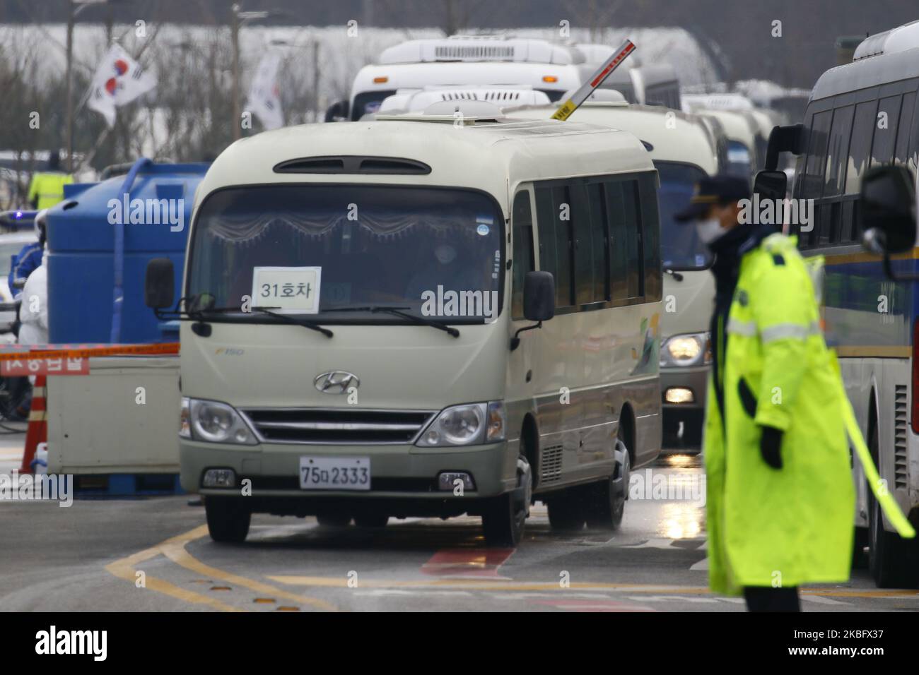 South Korean police bus return their station at state facility in ...