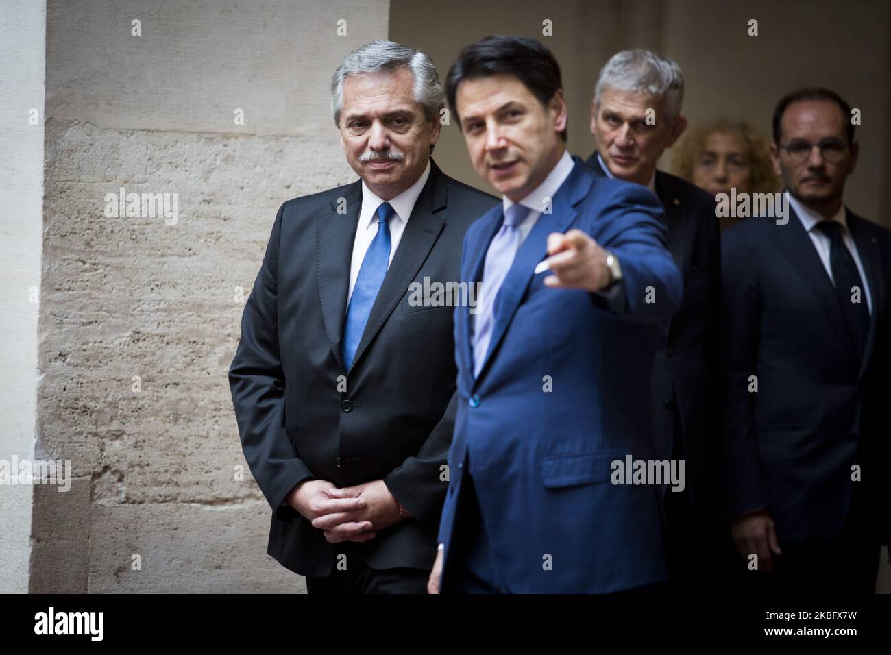 Italy's Prime Minister Giuseppe Conte greets Argentina's President ...