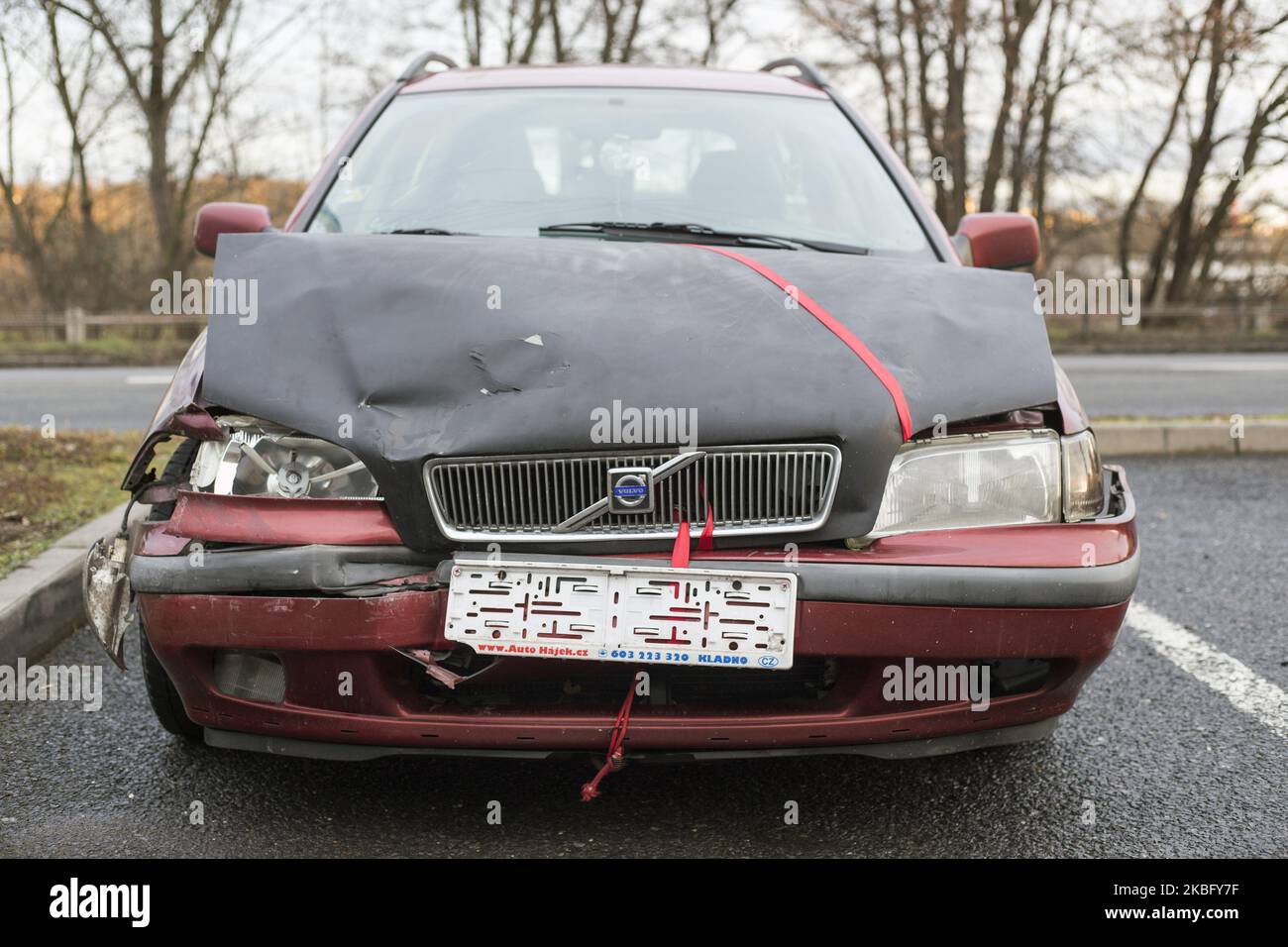 An old Volvo in red colour pictured damaged after a car accident in ...