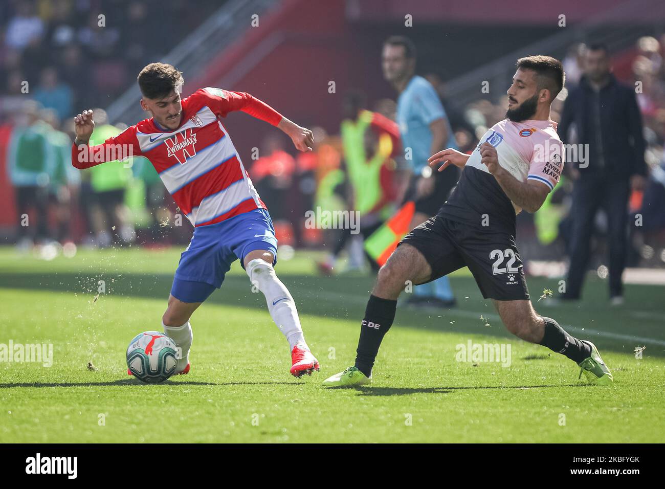 Carlos Neva of Granada CF and Matias Vargas of RCD Espanyol during the ...