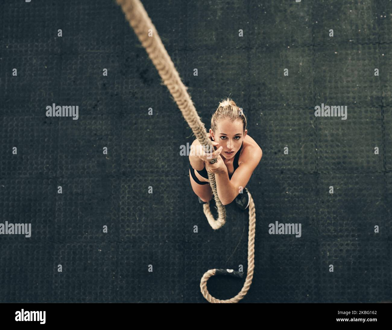 I can totally climb to the top. High angle shot of a fit and determined ...