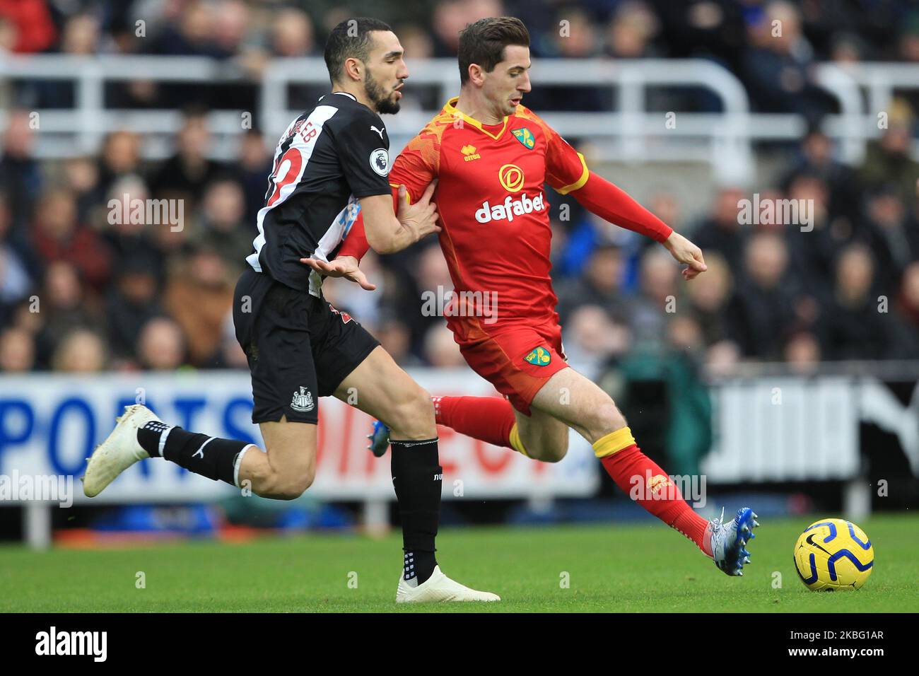 Nabil Bentaleb of Newcastle United in action with KennyMcLean of ...