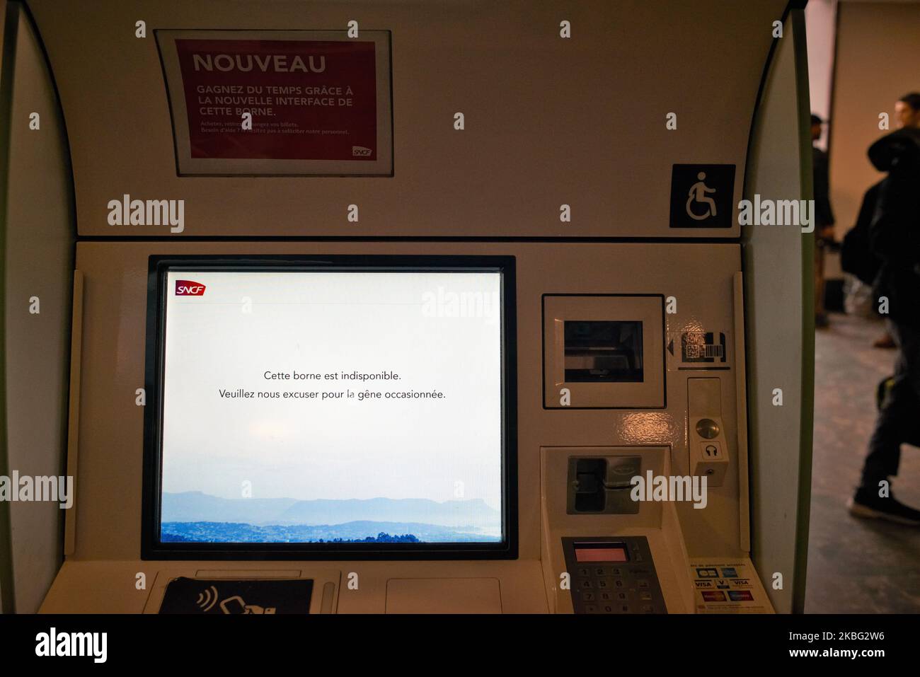 An ATM for buying train ticket is pictured out of order. The screen ...