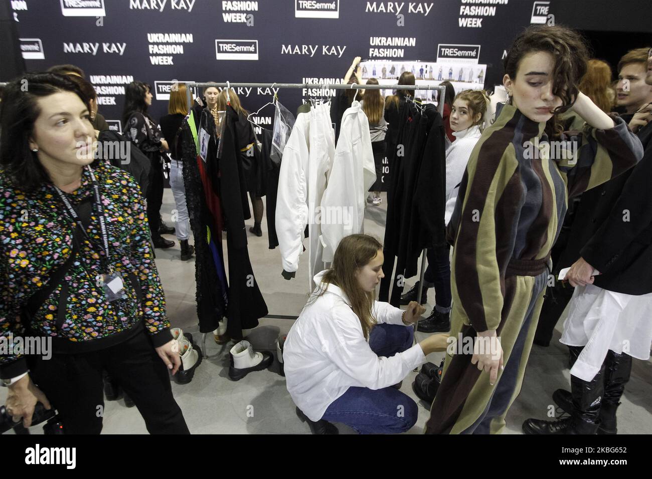Models prepare backstage during the Ukrainian Fashion Week FW 20-21 in ...