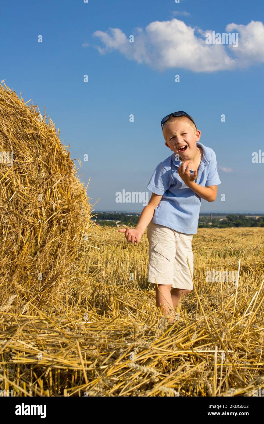 Boy in shorts hi-res stock photography and images - Alamy