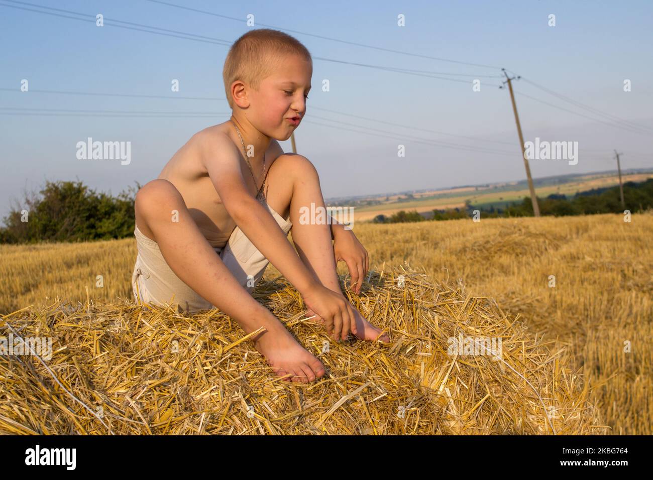 the last day of summer, the boy rejoices during holidays in the field ...