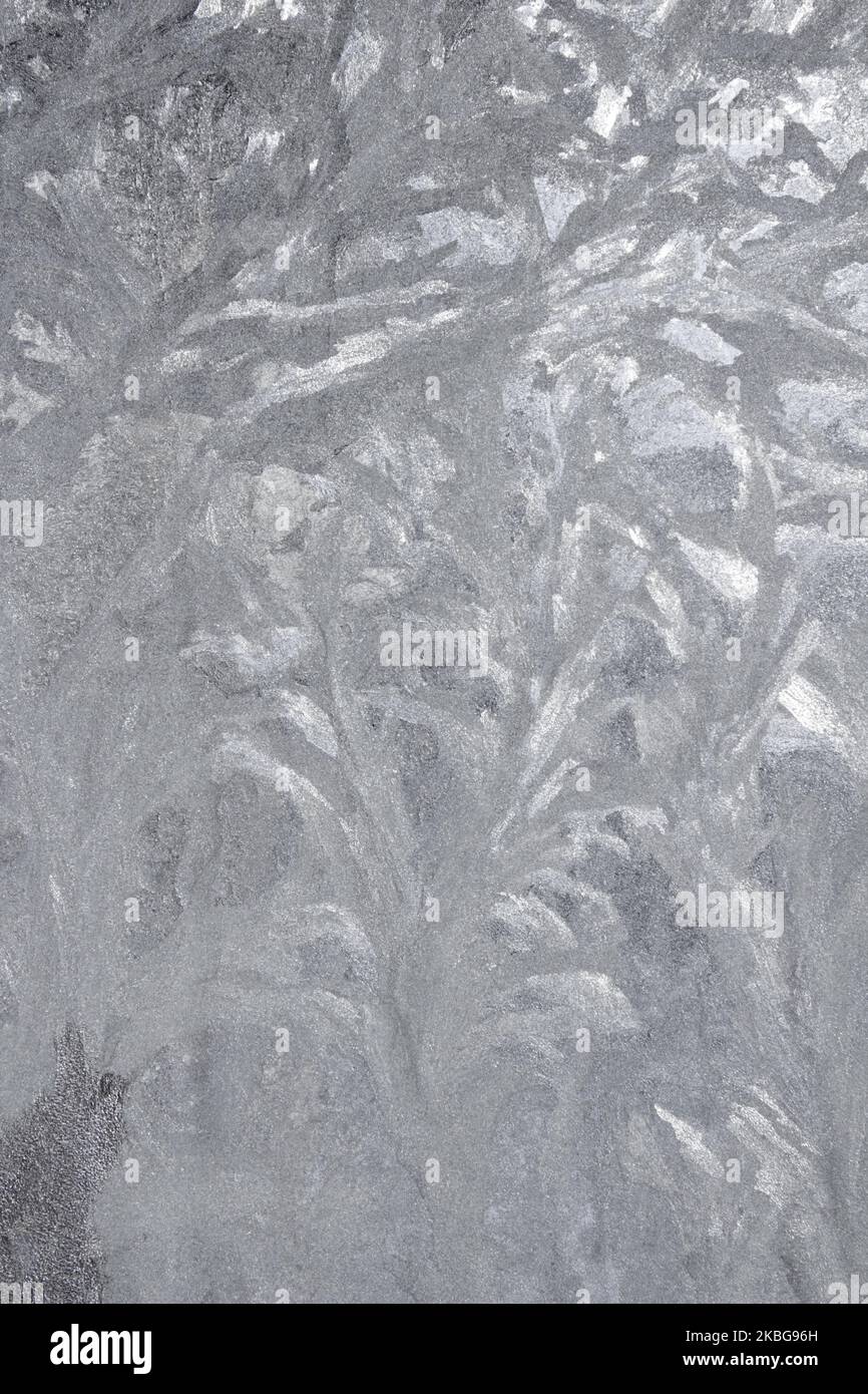 beautiful background Ice patterns on winter glass Stock Photo - Alamy