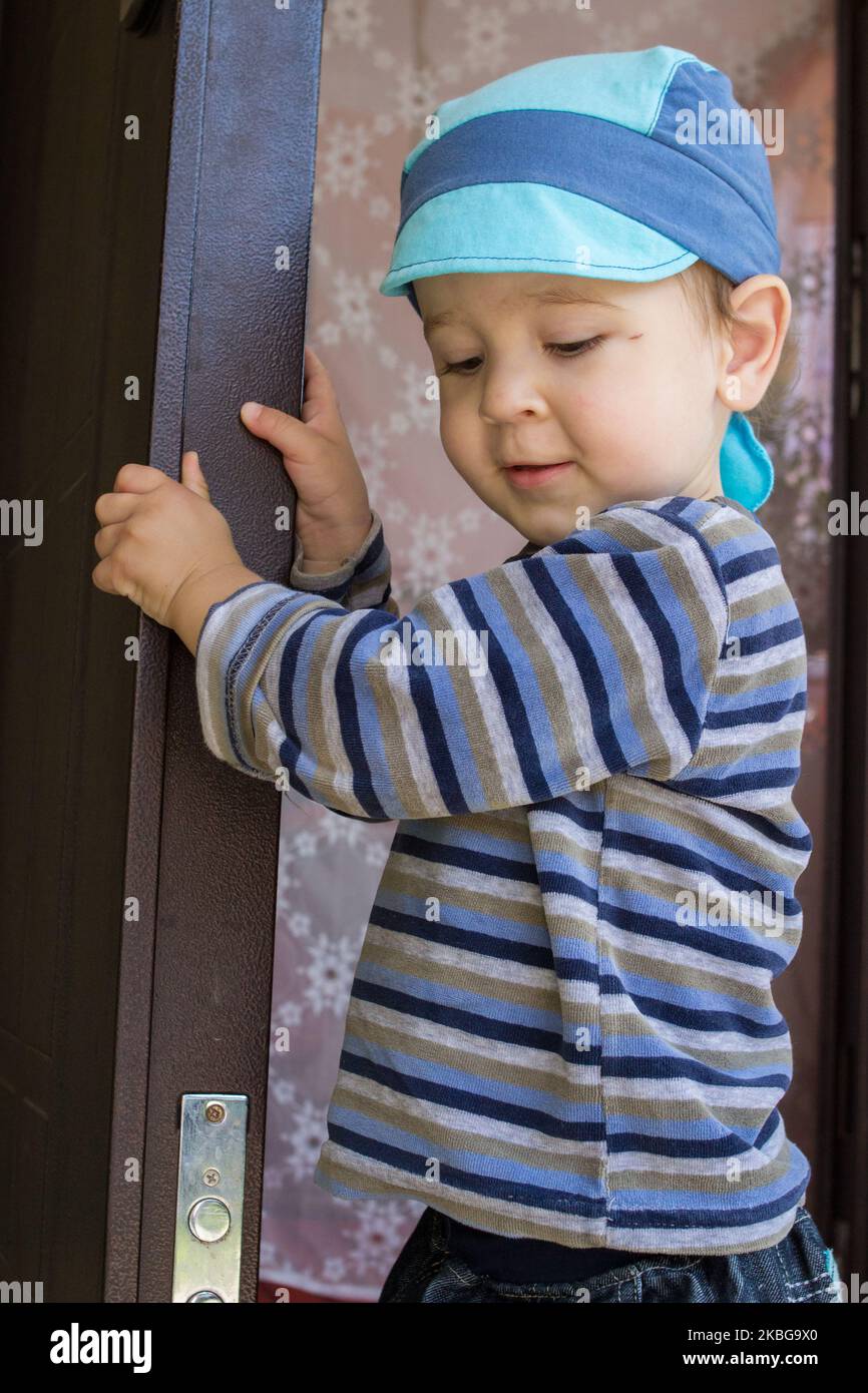 Child hands on door hi-res stock photography and images - Alamy
