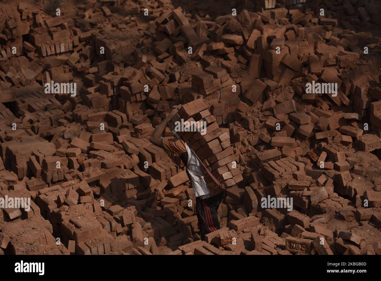 Labourer carrying hi-res stock photography and images - Alamy