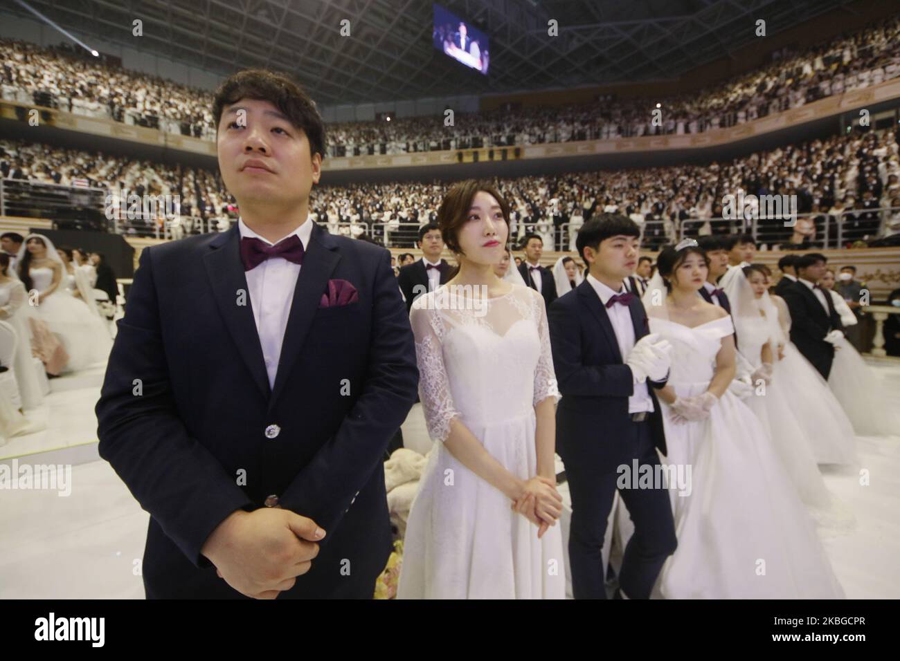 Thousands of couples take part in a mass wedding of the Family ...