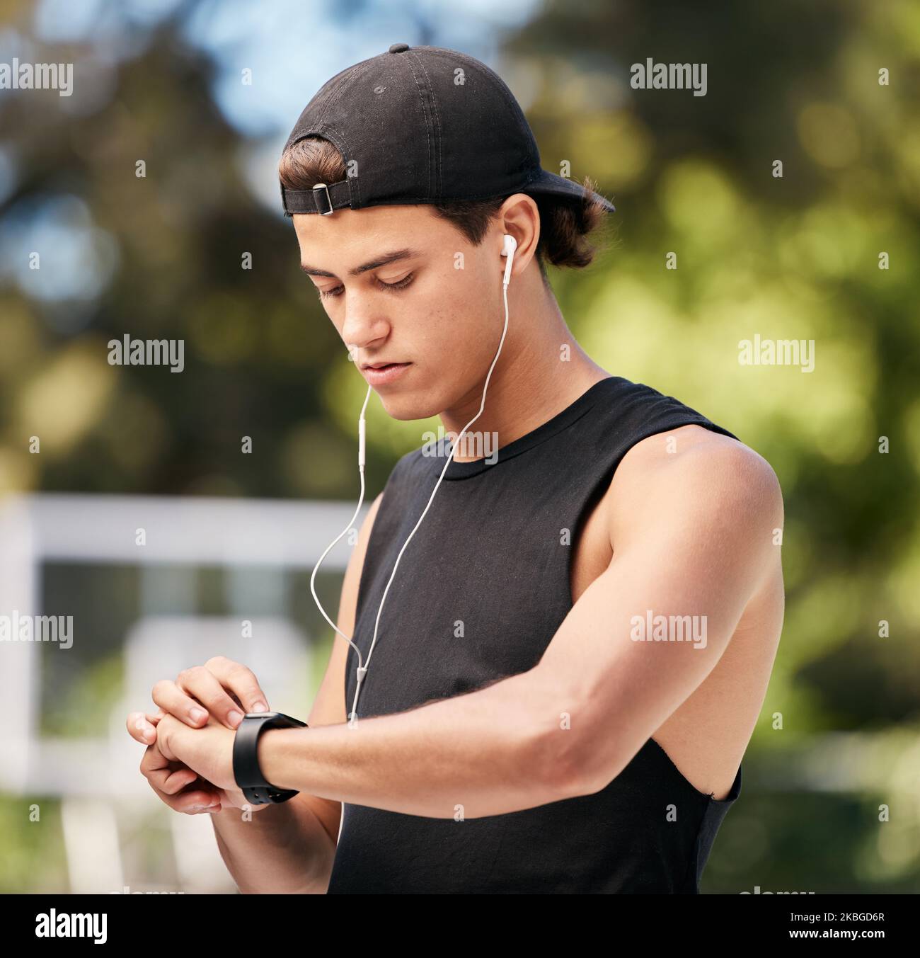 Fitness, time and man with smartwatch to monitor running workout ...