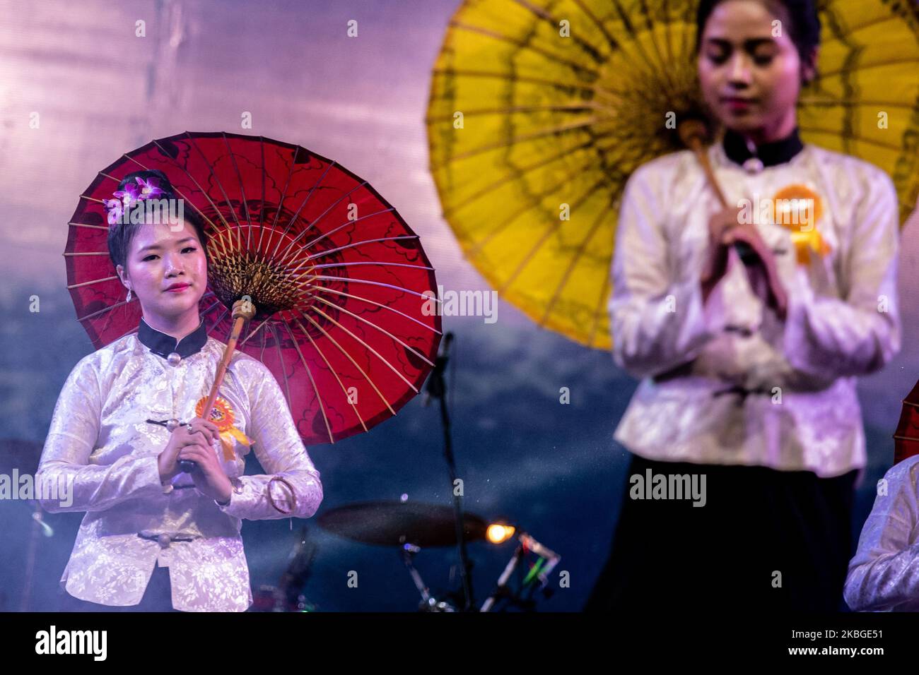 Shan ethnic woman in traditional attire perform on stage during a ...