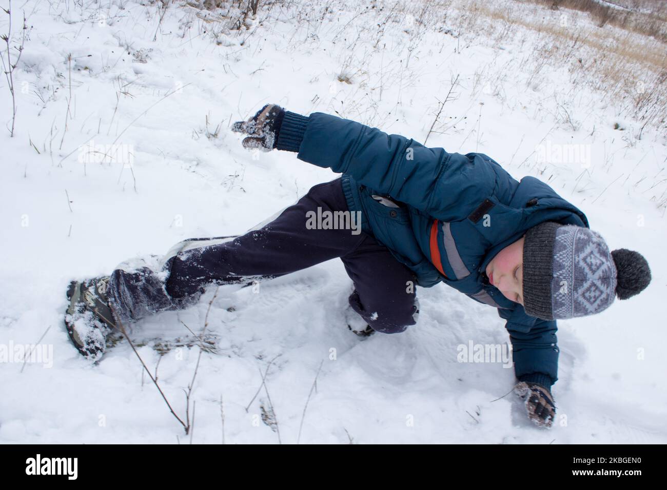boy in the village during the winter holidays Stock Photo - Alamy