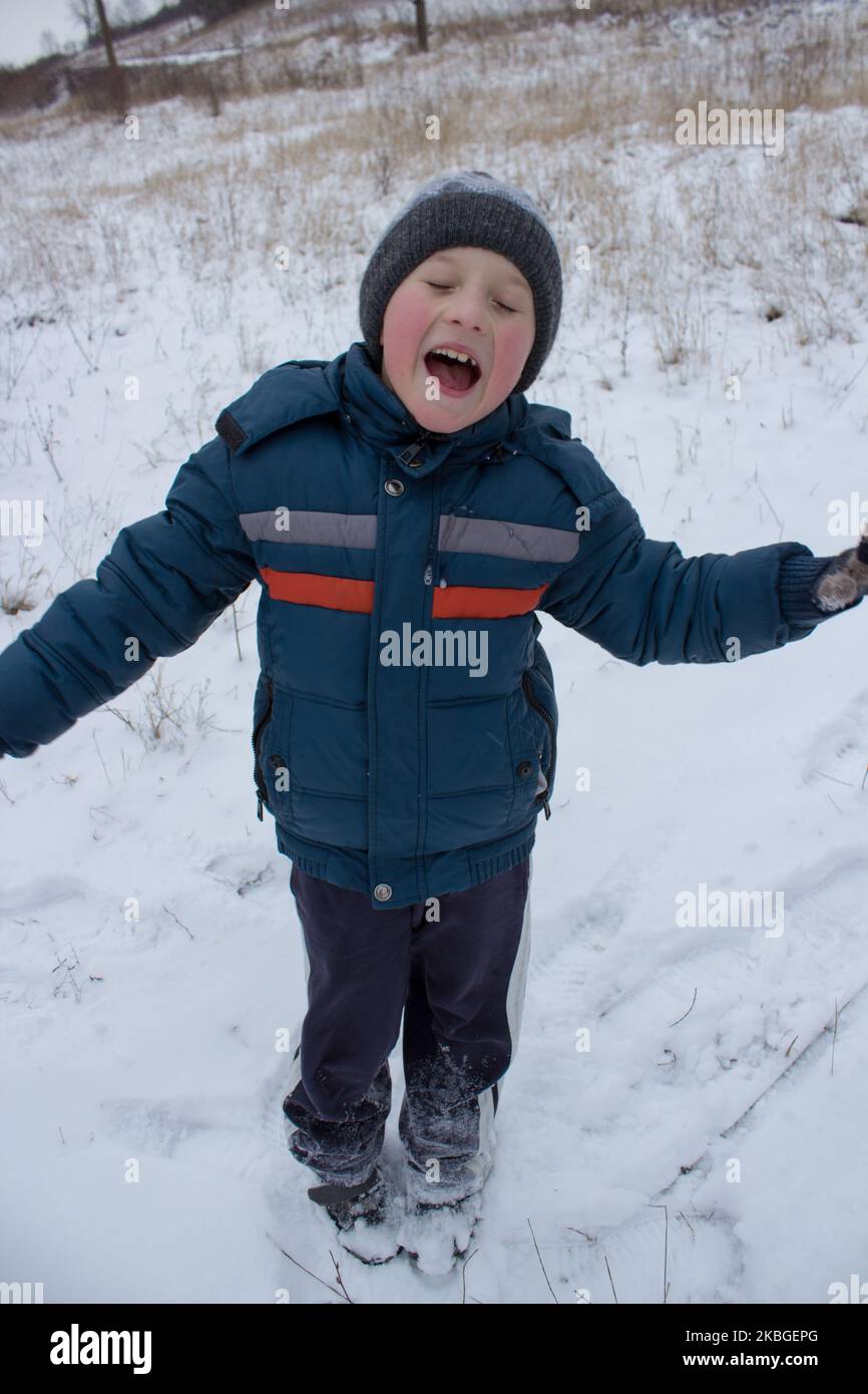 little boy enjoying in winter holiday,boy screaming in winter Stock ...