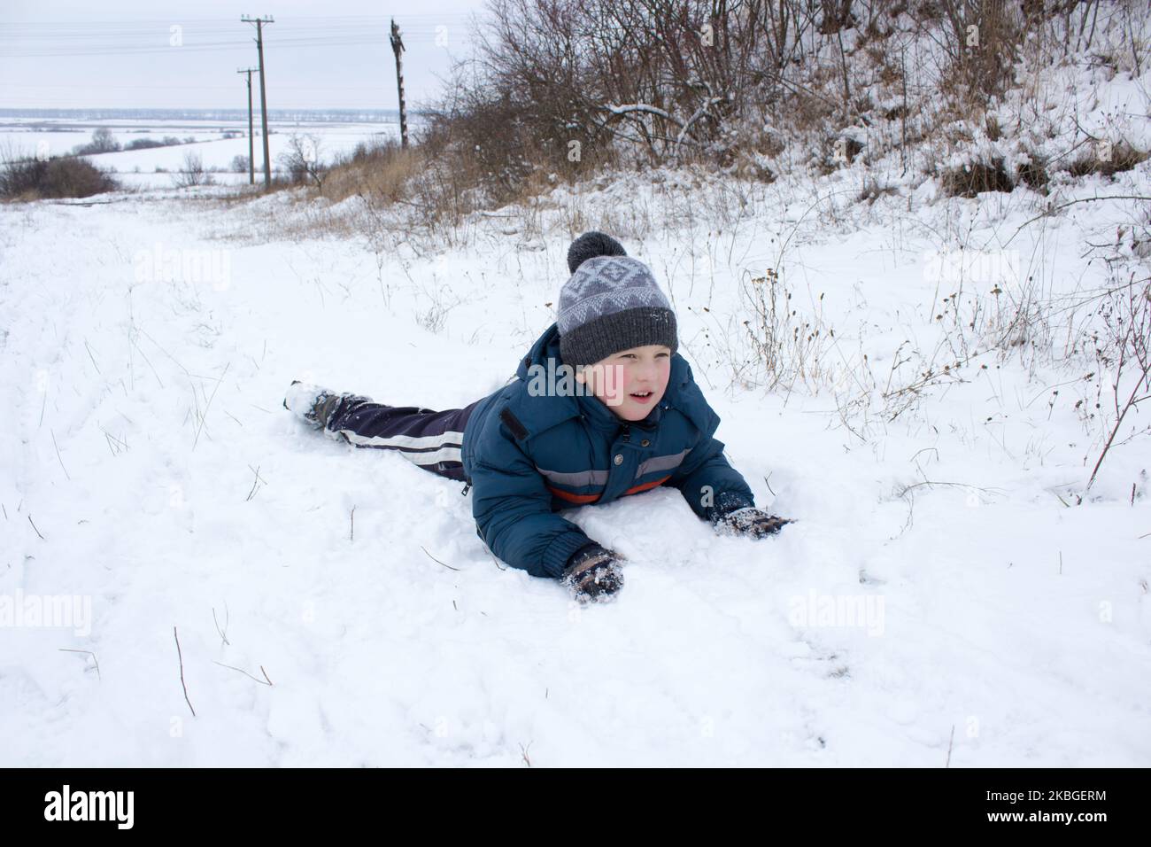 The boy was lucky in the snow and was glad Stock Photo - Alamy