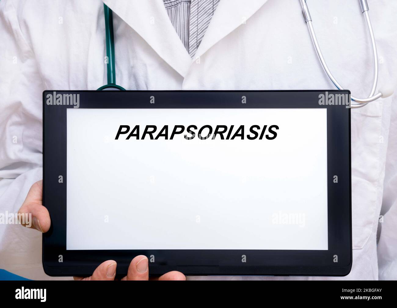 Parapsoriasis. Doctor with rare or orphan disease text on tablet screen ...