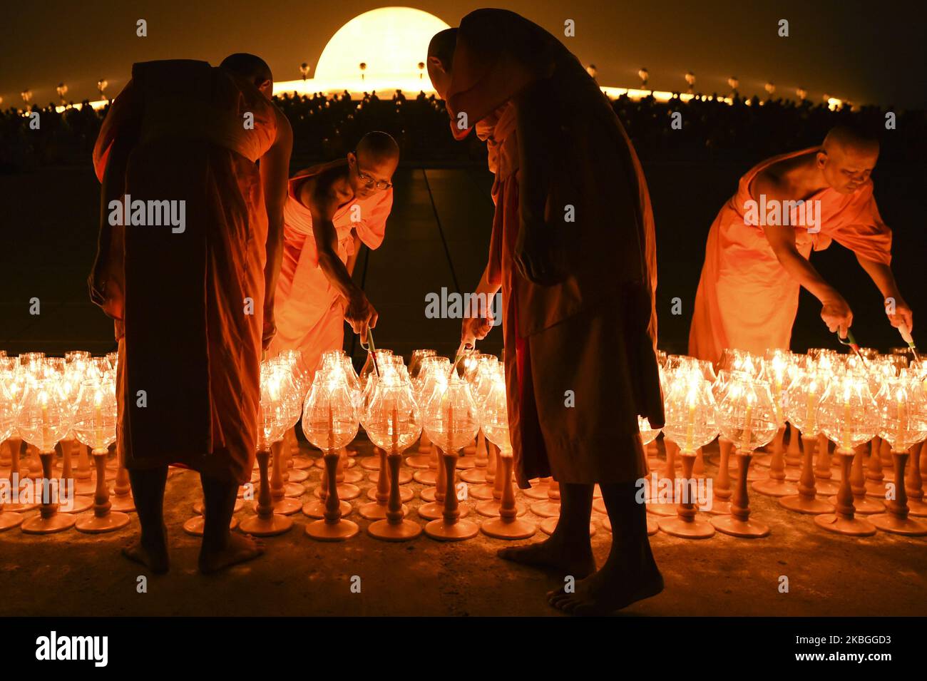 Thai buddhist monks light lanterns hi-res stock photography and images ...