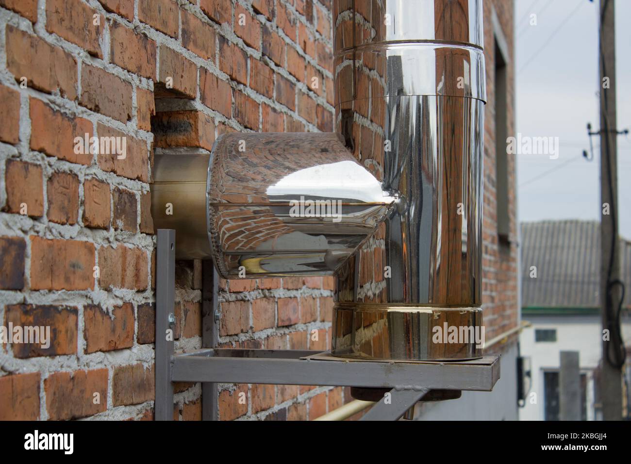 hole in the wall and chimney pipeof stainless steel Stock Photo - Alamy