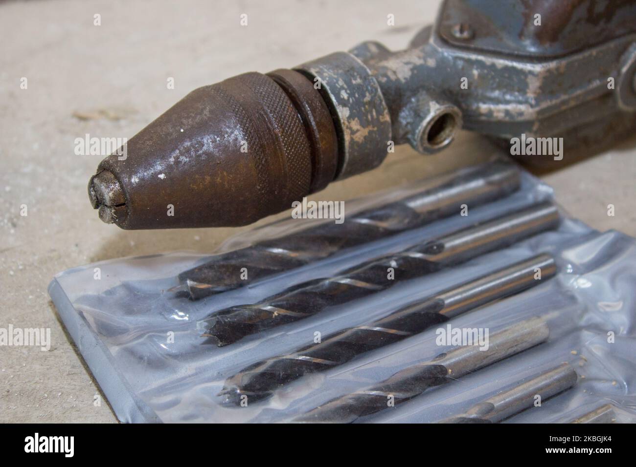 old hand drill with drill new on the Desktop Stock Photo - Alamy