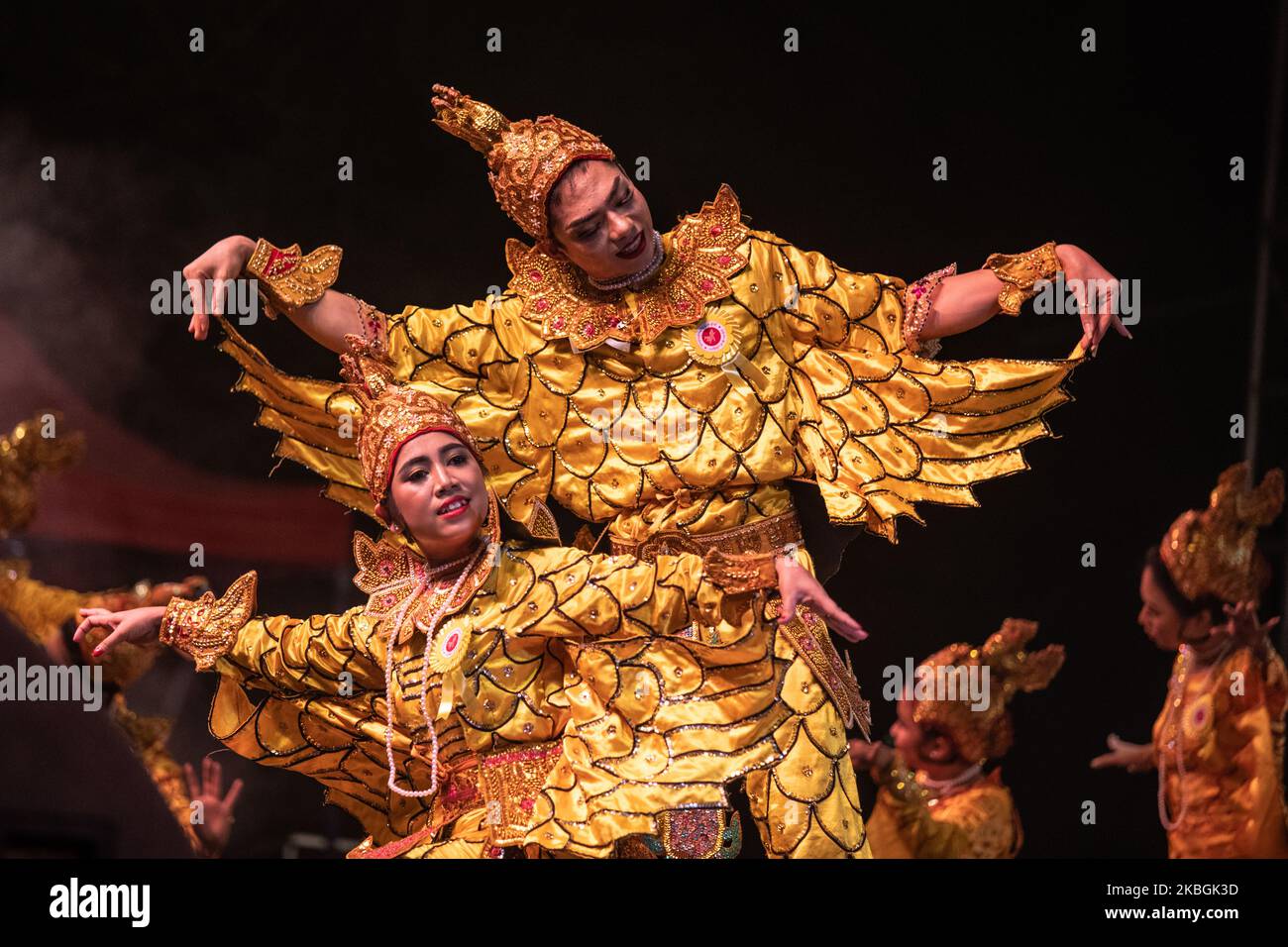 Dancers perform on stage during the 73rd Mon National Day celebration ...