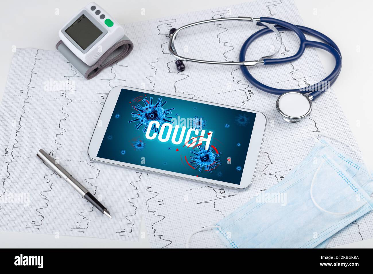 Tablet pc and doctor tools on white surface Stock Photo - Alamy